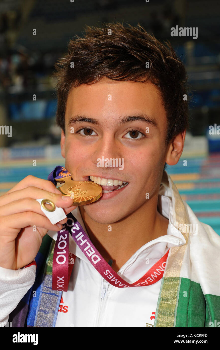 England diver Tom Daley celebrates with his Gold Medal following his ...