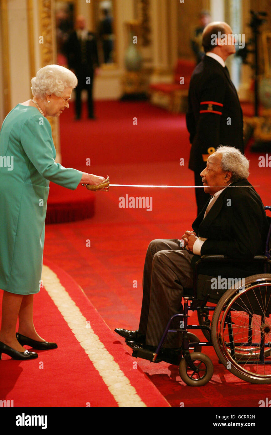 Sir wilson harris receives his knighthood from queen elizabeth ii hi ...