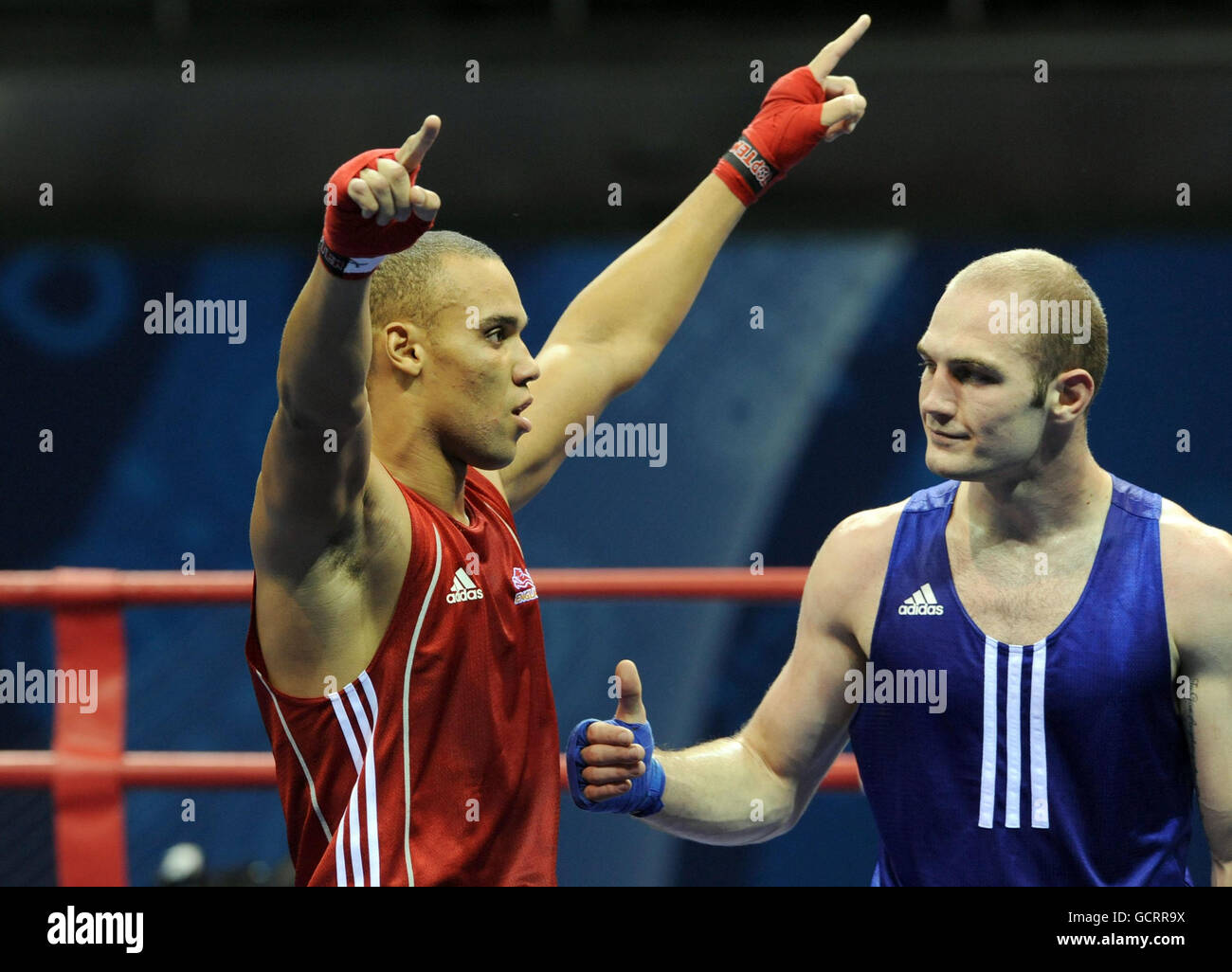 England's Simon Vallily celebrates winning the gold medal after beating ...