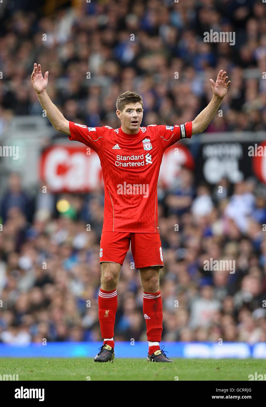 Liverpool's Steven Gerrard complains about a decision made by referee ...