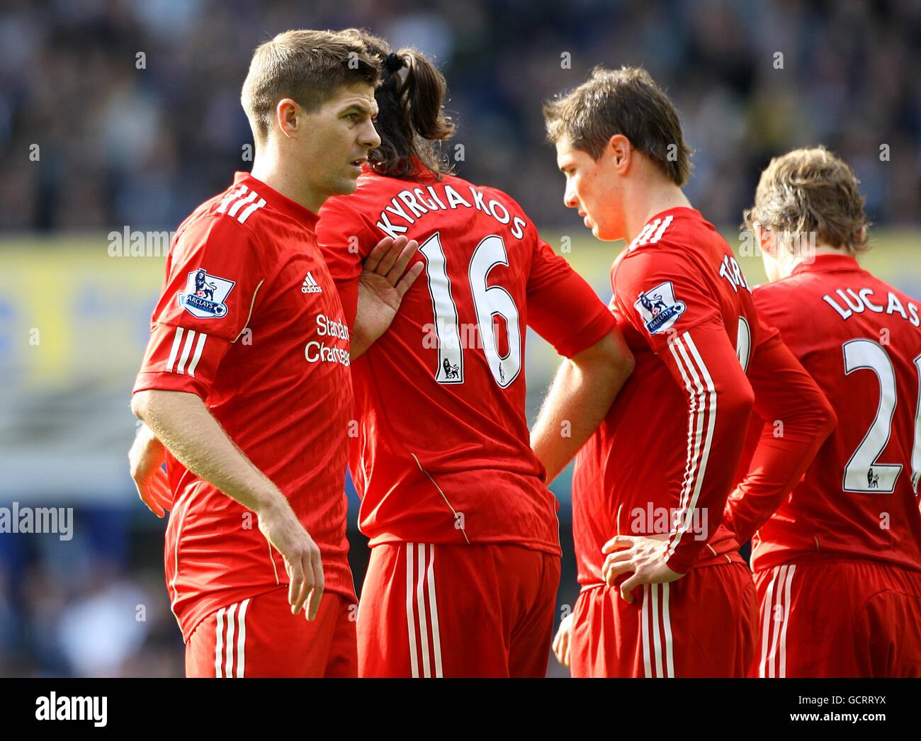 Liverpool's Steven Gerrard (left) and his team-mates form a wall to ...