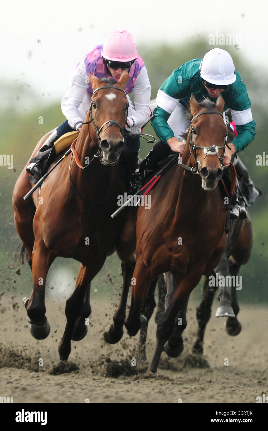 Horse Racing - Lingfield Park. Jockey Ryan Moore on Garde Cotiere (left ...
