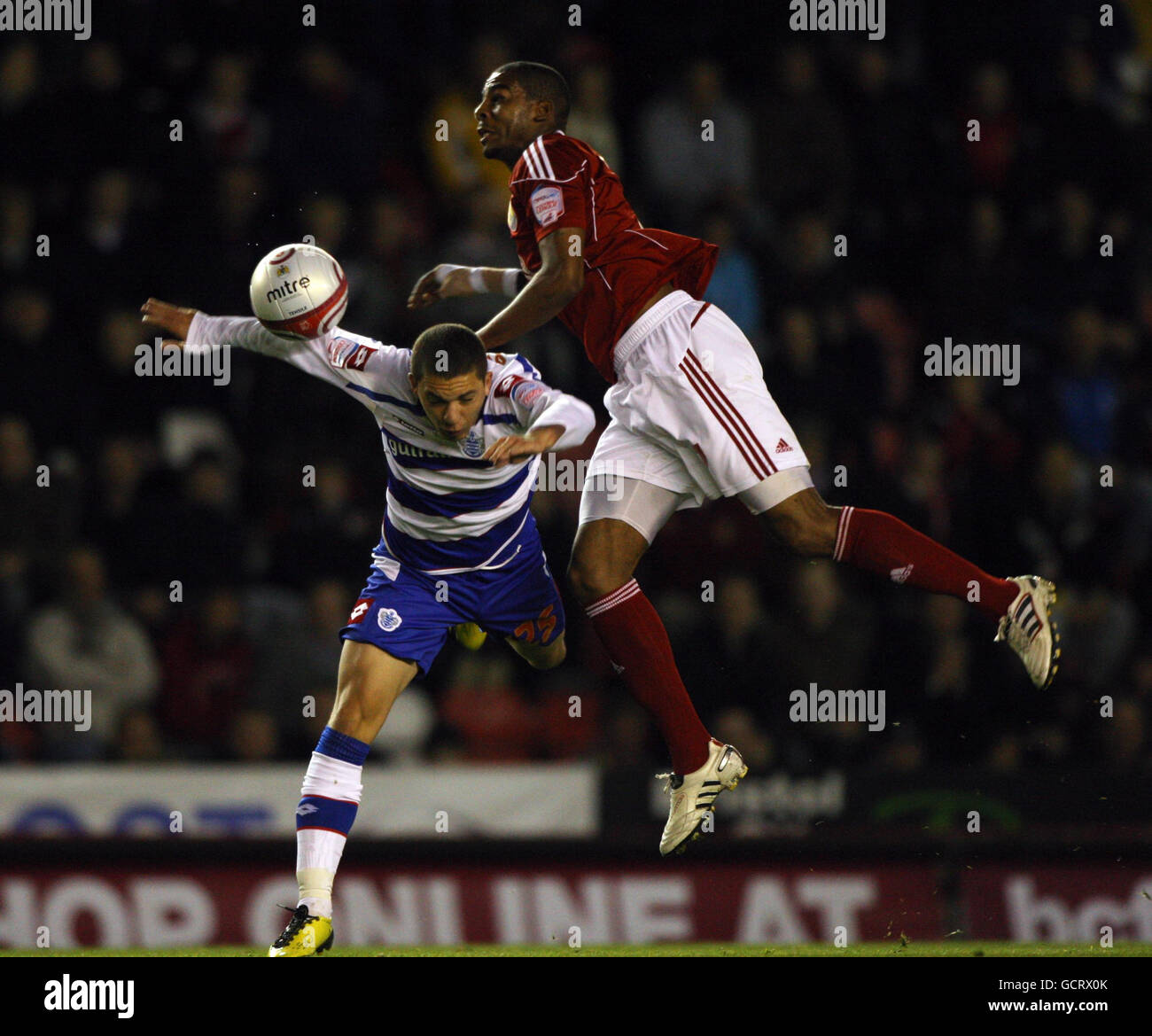 Bristol City's Marvin Elliott wins the header beating Queens Parks ...