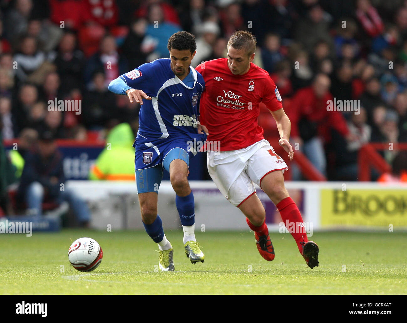 Nottingham Forest's Luke Chambers and Ipswich Town's Carlos Edwards ...