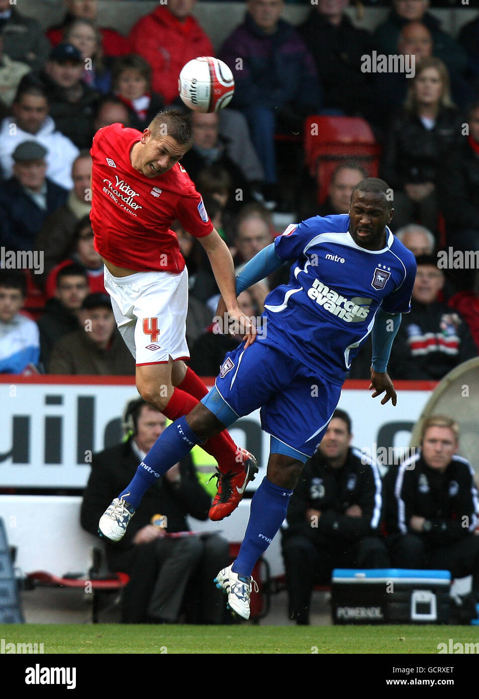 Nottingham Forest's Luke Chambers and Ipswich Town's Jason Scotland ...