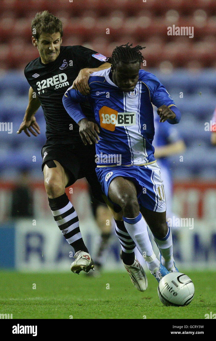 Soccer wigan full length battling mangsk datacoapplies hi-res stock ...
