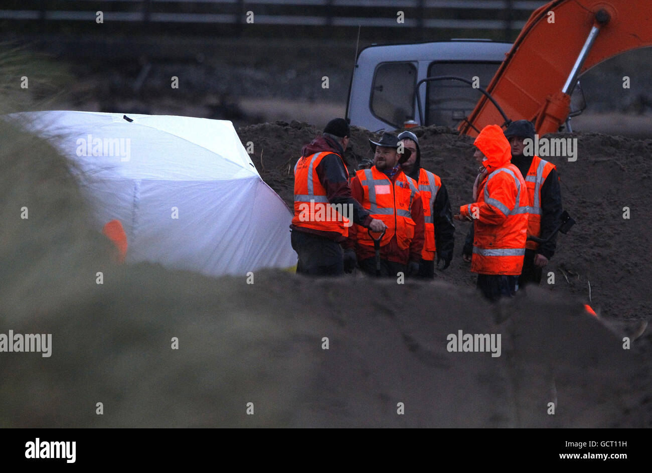 A police tent covers a body found on a beach at Waterfoot in Co Antrim ...