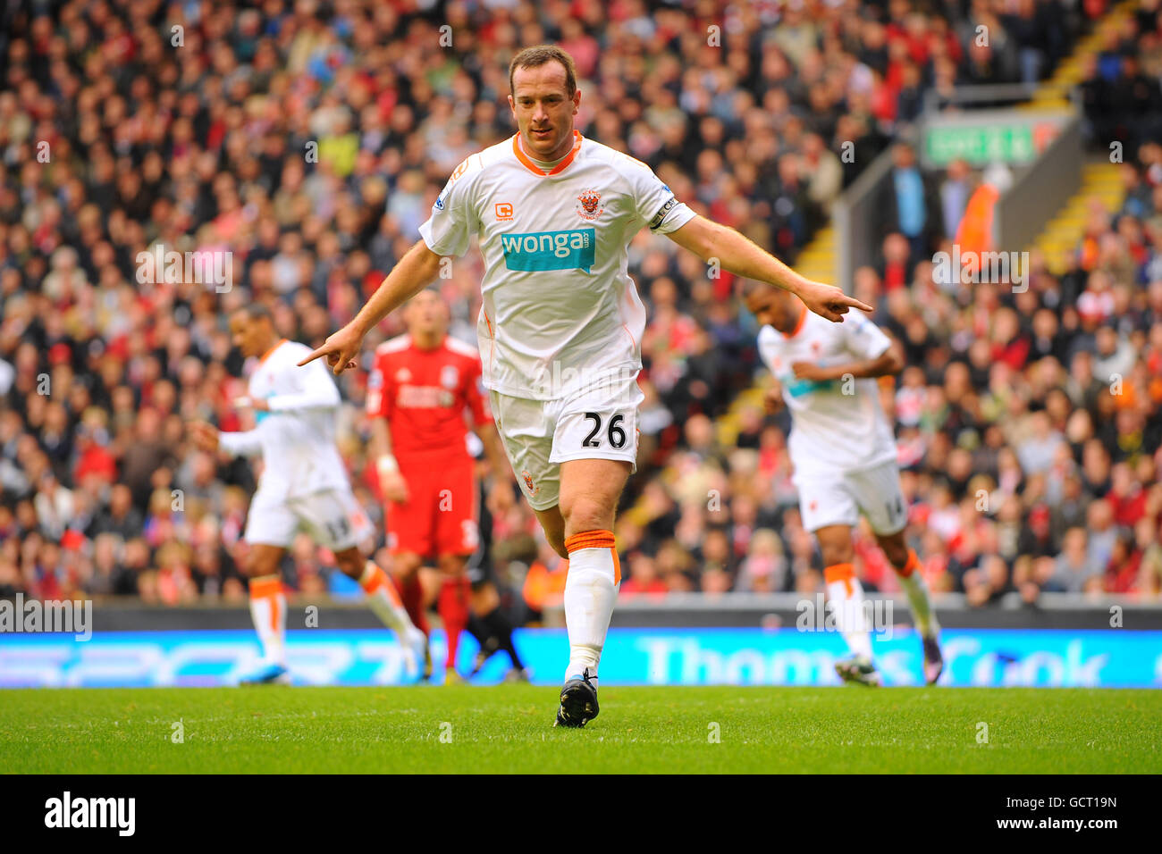 Blackpool's Charlie Adam celebrates after scoring the opening goal of ...