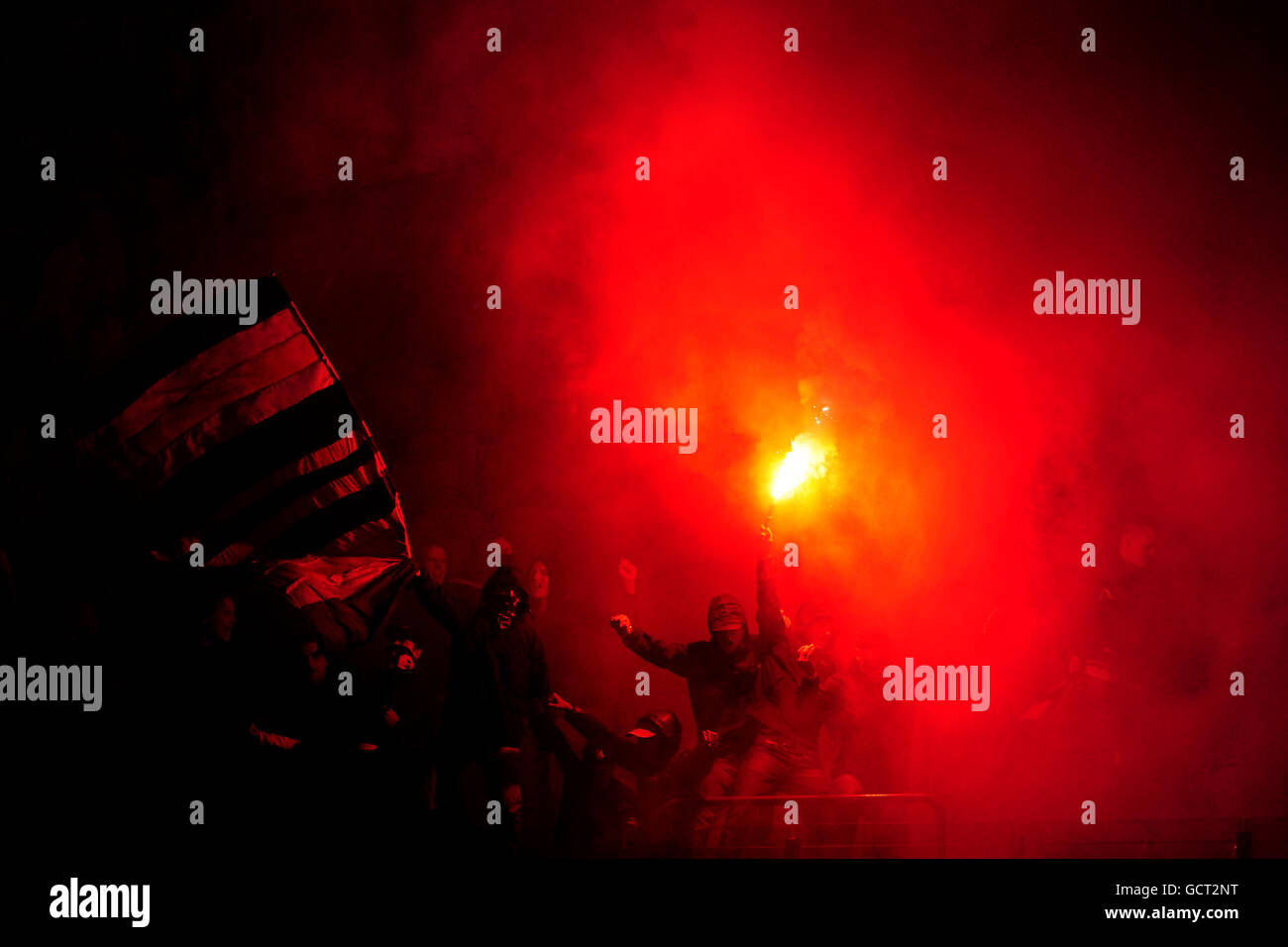 Ajaxs fans set of flares during the game hi-res stock photography and ...