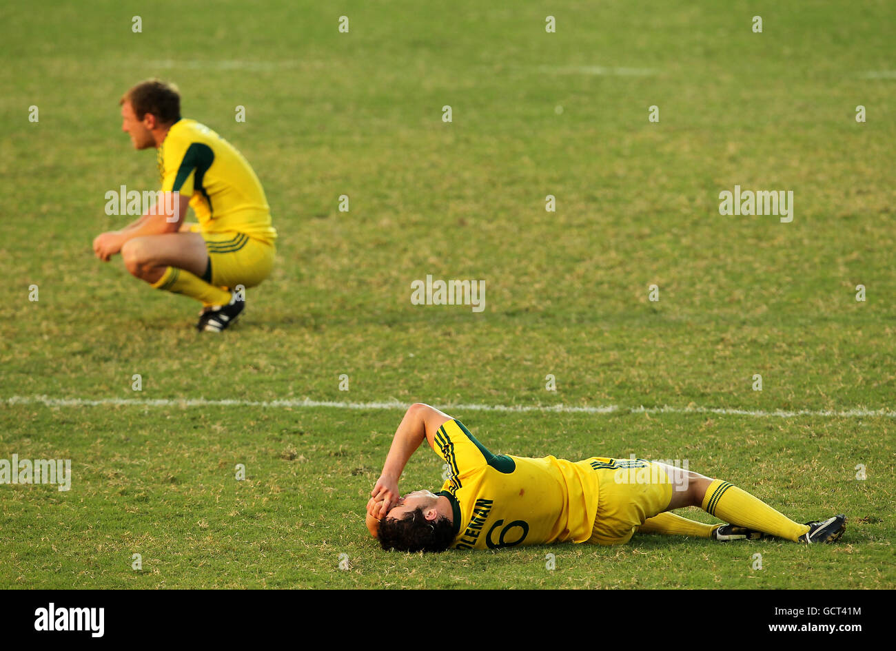 Australia's Robbie Coleman (right) and James Stannard (left) lie ...