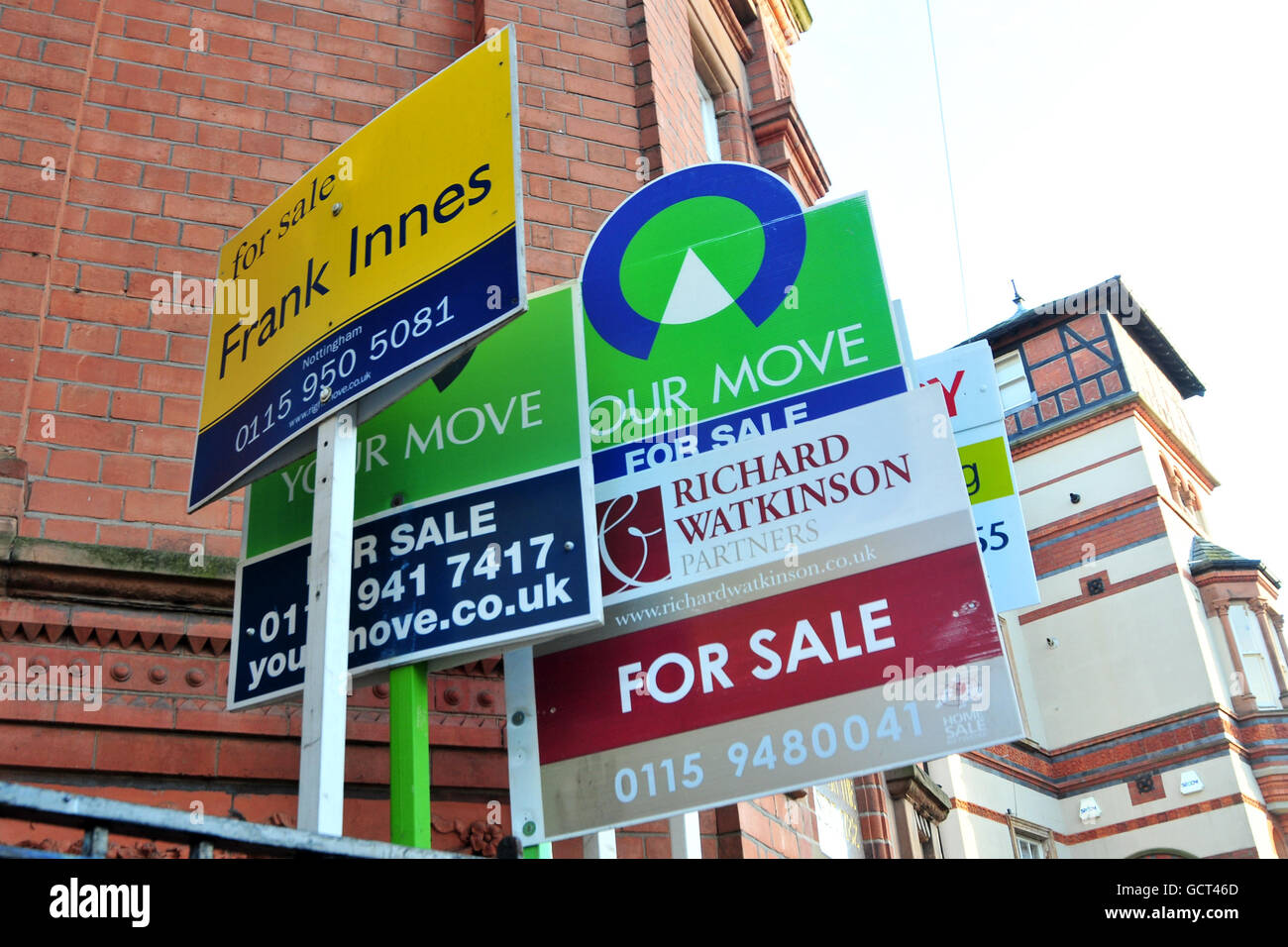General view of for sale signs outside a block of flats Stock Photo - Alamy