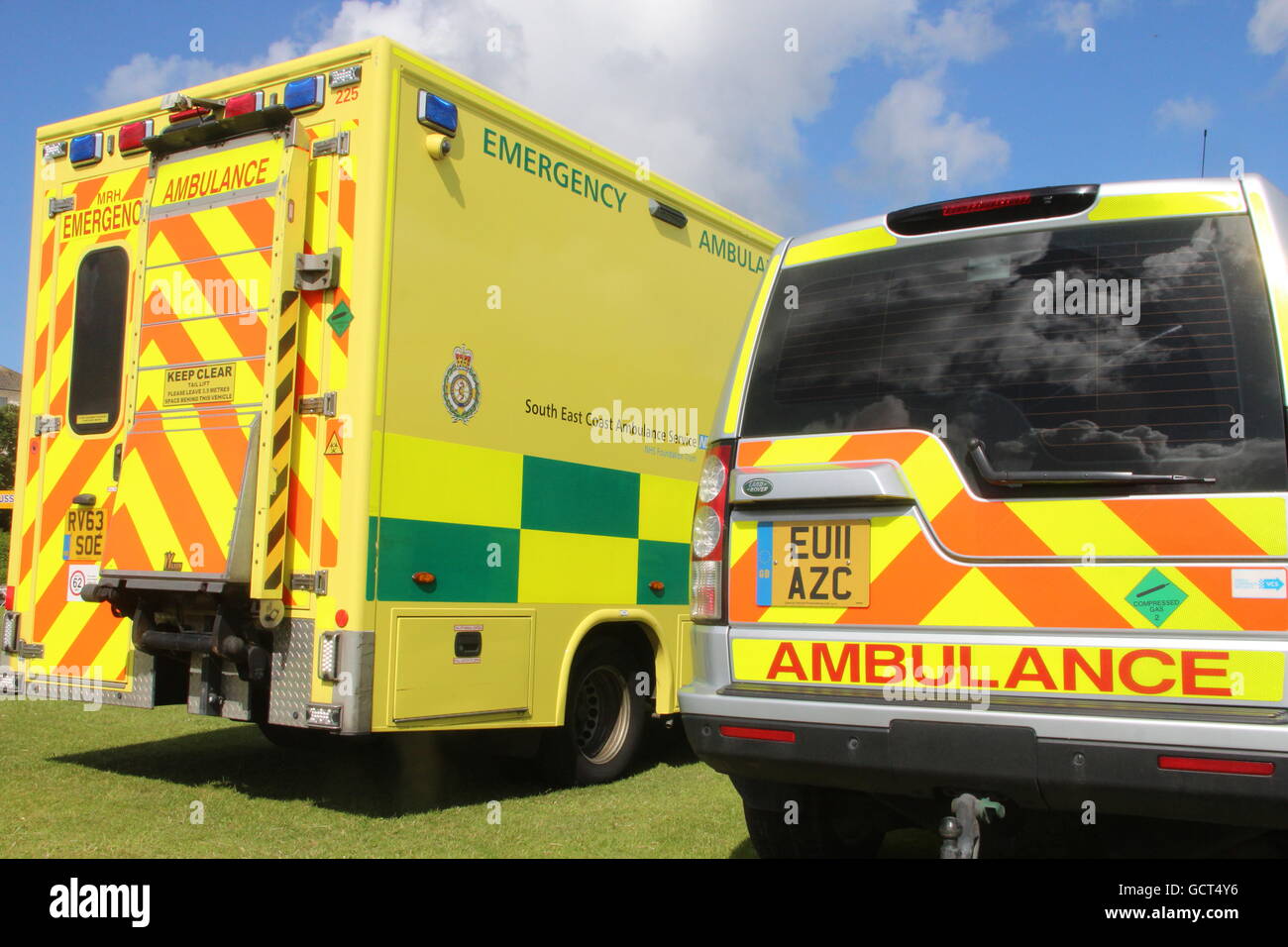 BACK OF SOUTH EAST COAST AMBULANCE VEHICLES PARKED TOGETHER,AN ...
