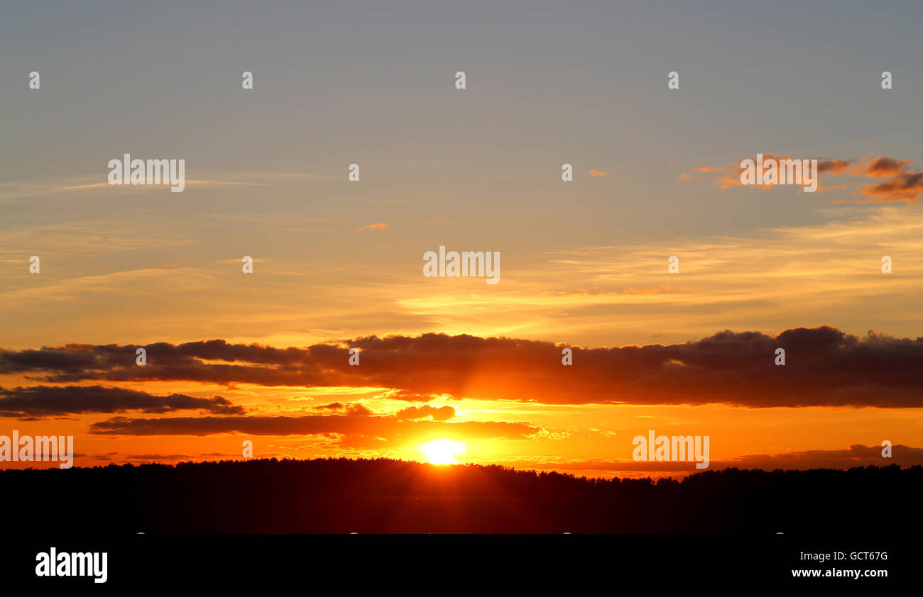 Beautiful Sunny sunset in a field in Russia Stock Photo - Alamy