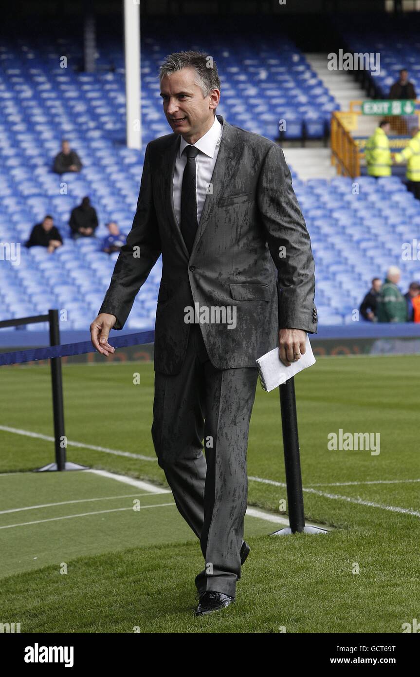 Sky Sports presenter Alan Smith gets caught out by the sprinklers after ...