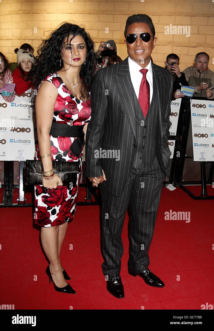 Jermaine Jackson and his wife Halima Rashid arriving for the 2010 Mobo ...