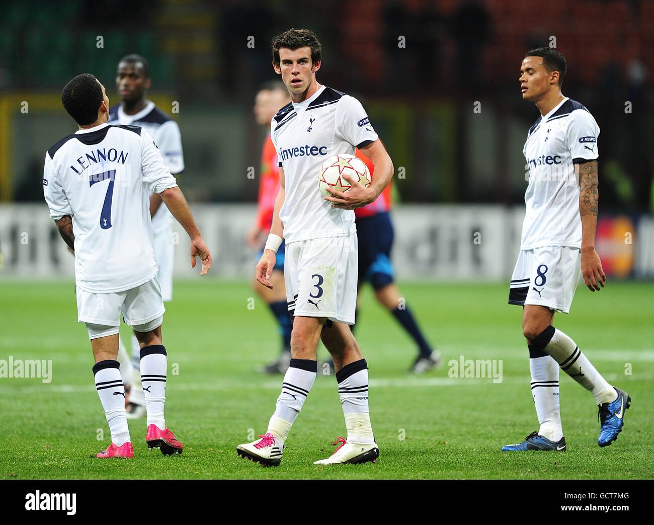 Tottenham Hotspur's Gareth Bale (centre) recieves the match ball after ...