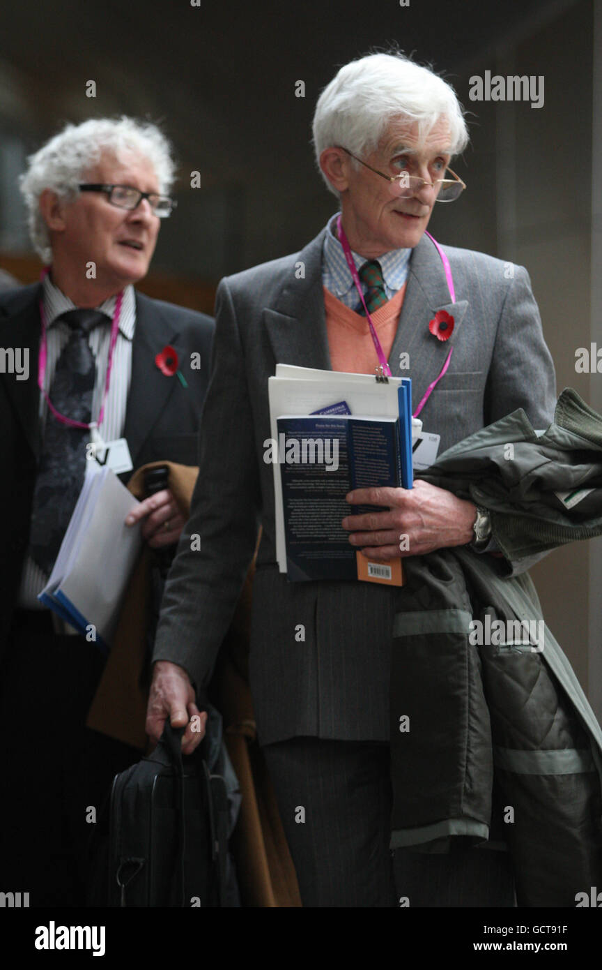Dr Jim Swire arrives with Iain McKee at the Scottish Parliament in ...