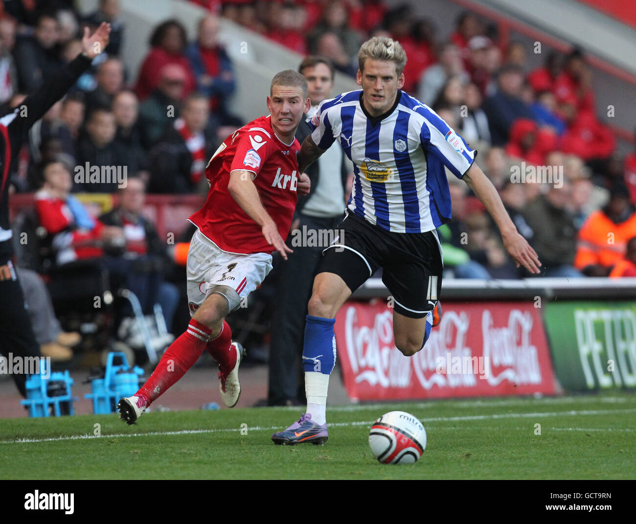 Charlton Athletic's Scott Wagstaff competes for the ball with Sheffield ...