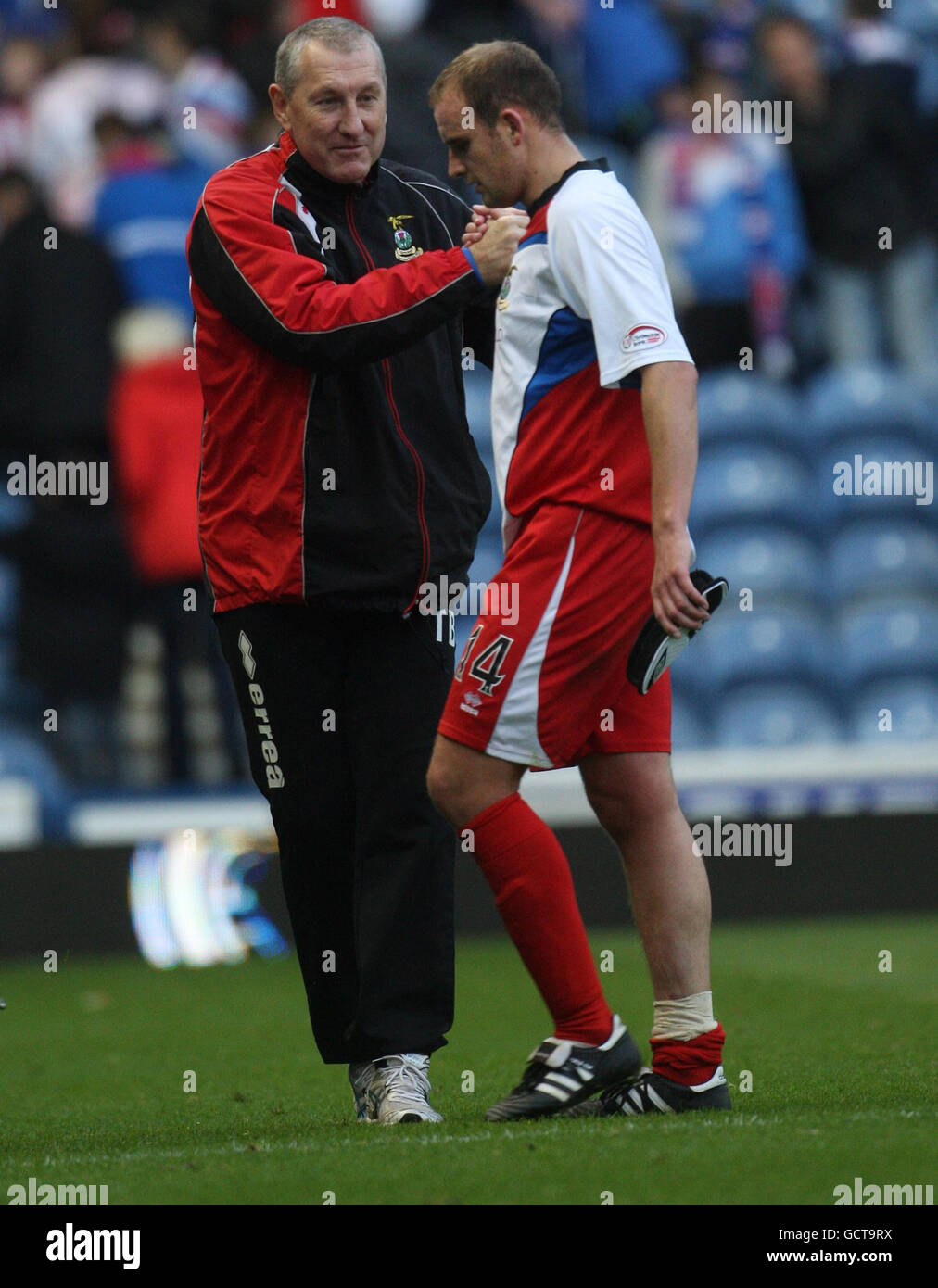 Inverness's manager Terry Butcher celebrates with Grant Munro after the ...