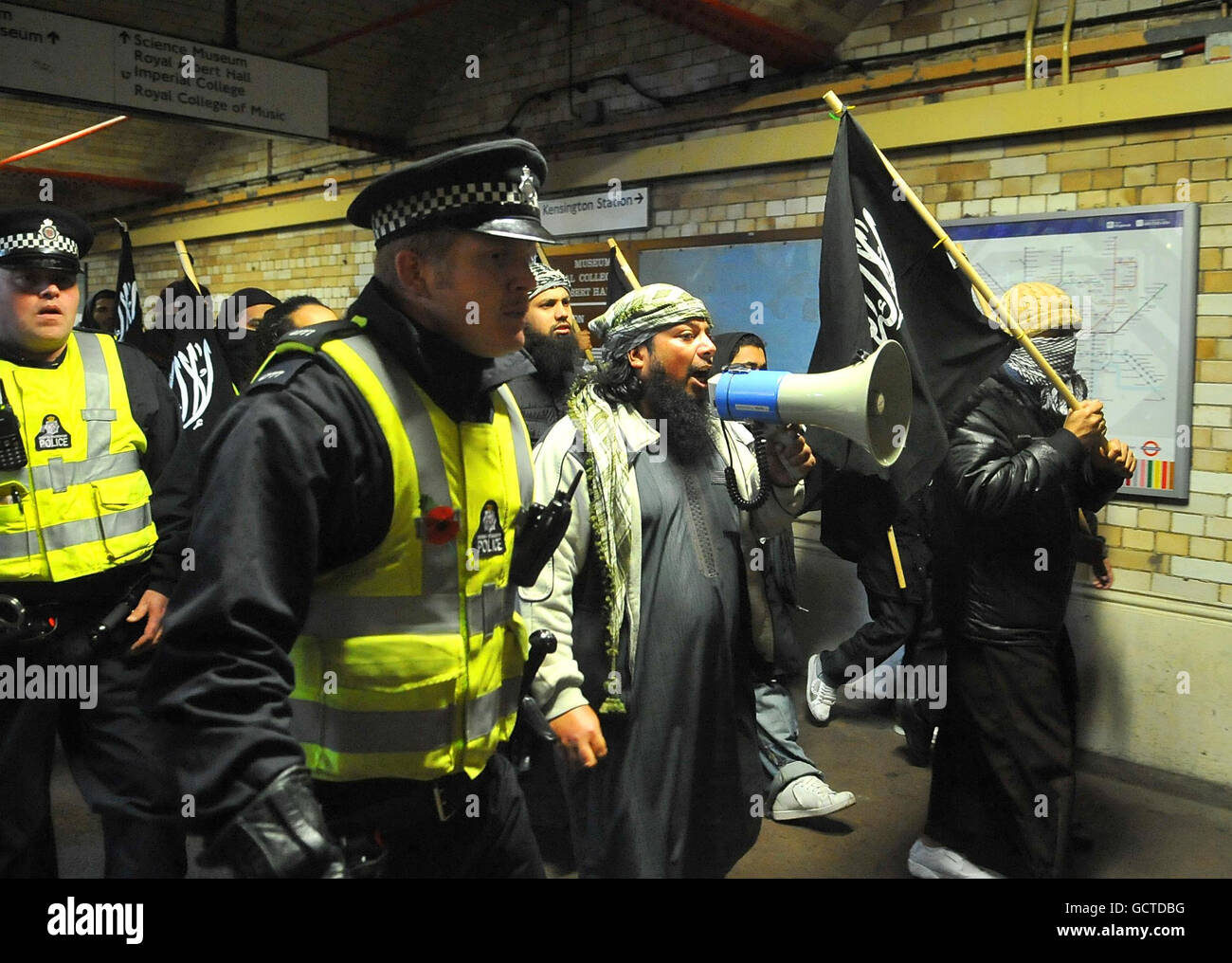 Muslims protesters are lead by police to South Kensington underground ...