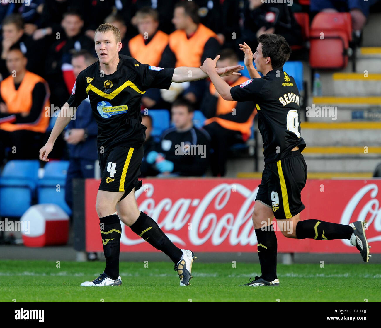 Torquay Utd's Mark Ellis (left) celebrates with Elliot Benyon after ...