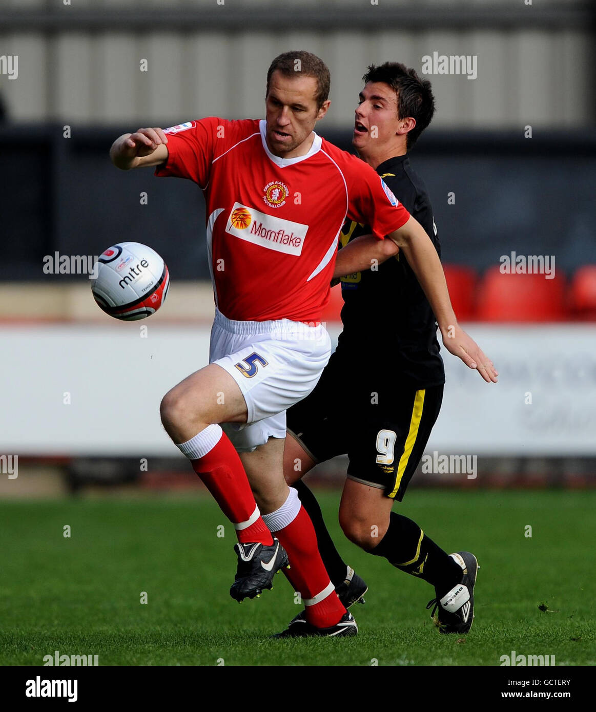 Crewe Alexandra's David Artell and Torquay United's Elliot Benyon ...