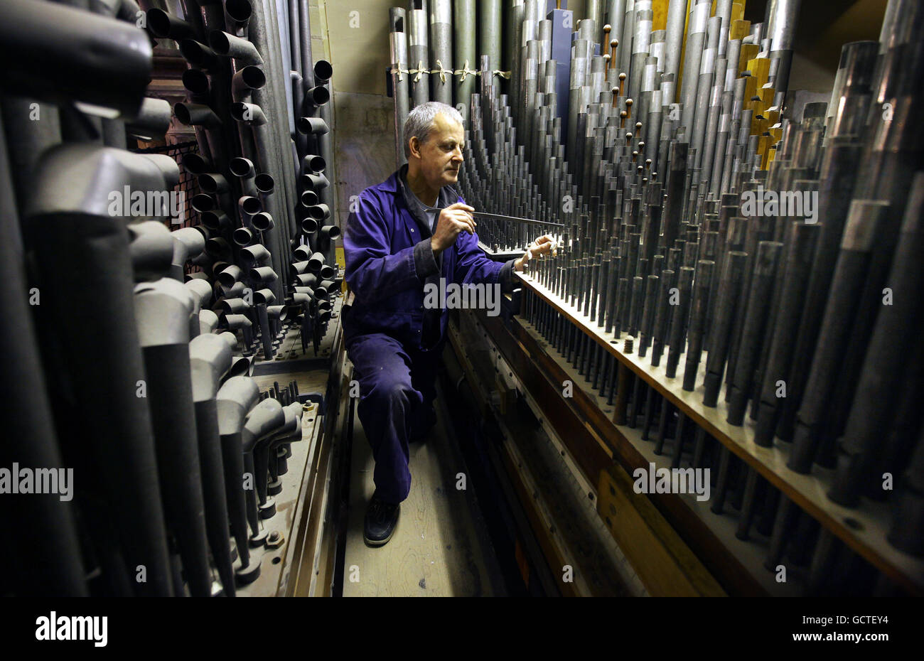 Organ Tuner David Wintle at work in the organ loft of Canterbury ...