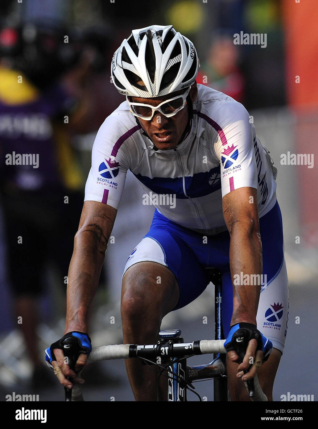 Scotland's David Millar crosses the finish line in third place during ...
