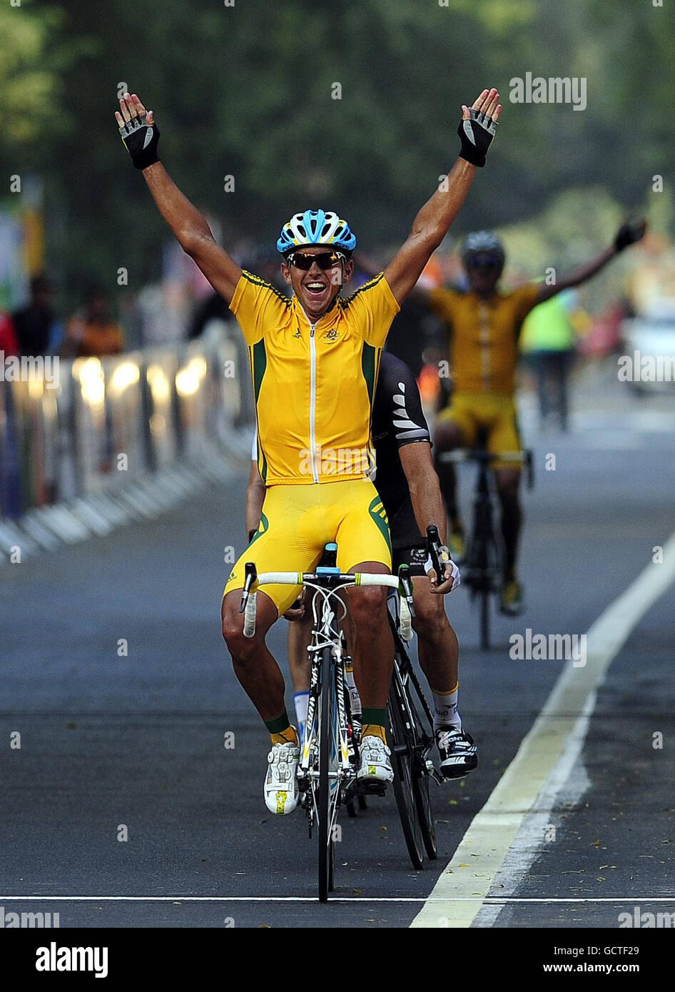 Australia's Allan Davis celebrates as he crosses the line first during ...