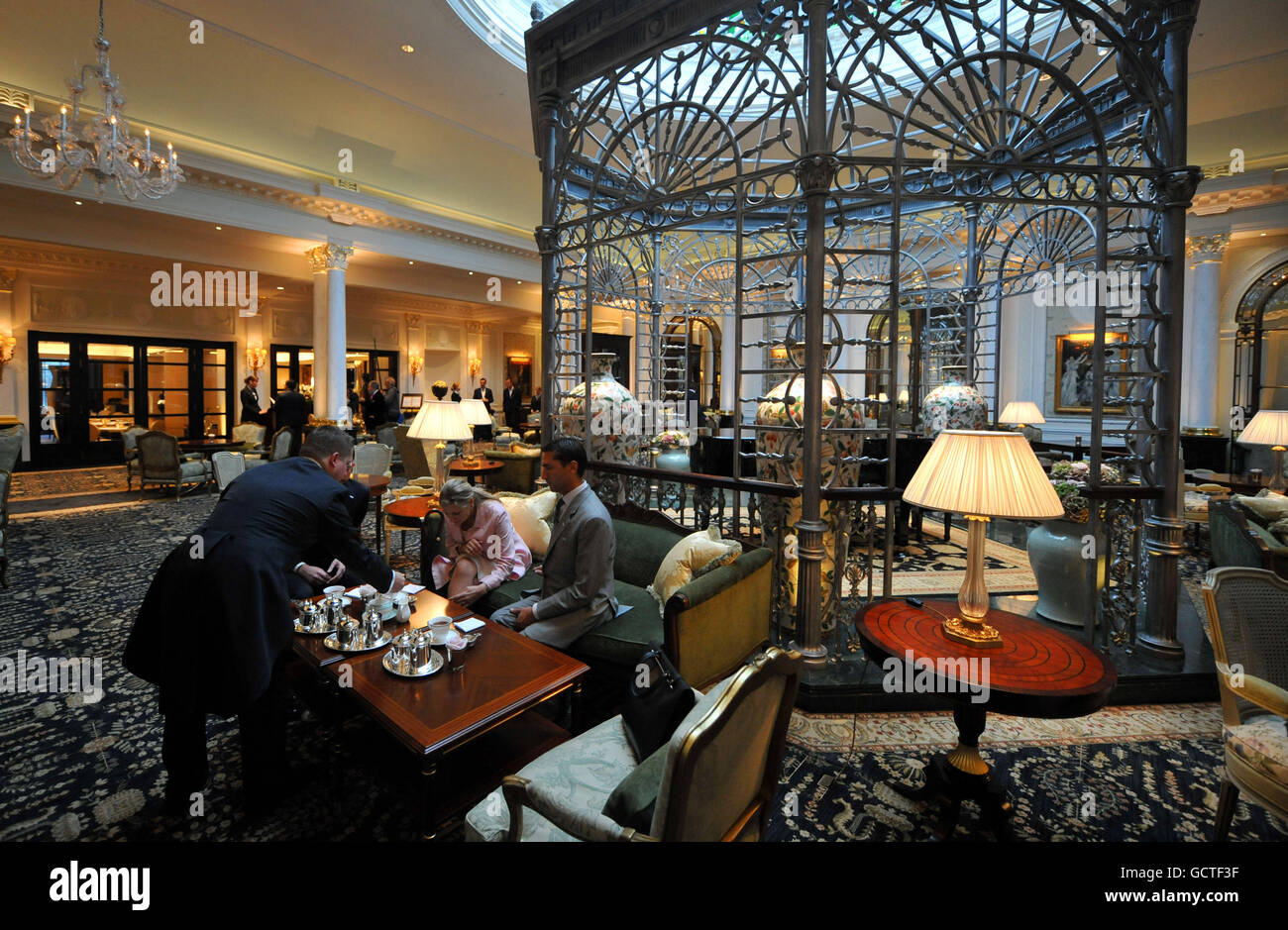Guest are served by staff in the Thames Foyer in the Savoy Hotel in ...