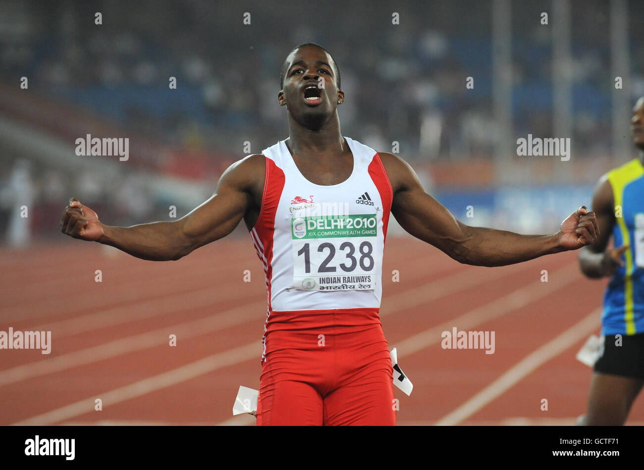 England's Leon Baptiste celebrates winning gold in the Men's 200m Final ...