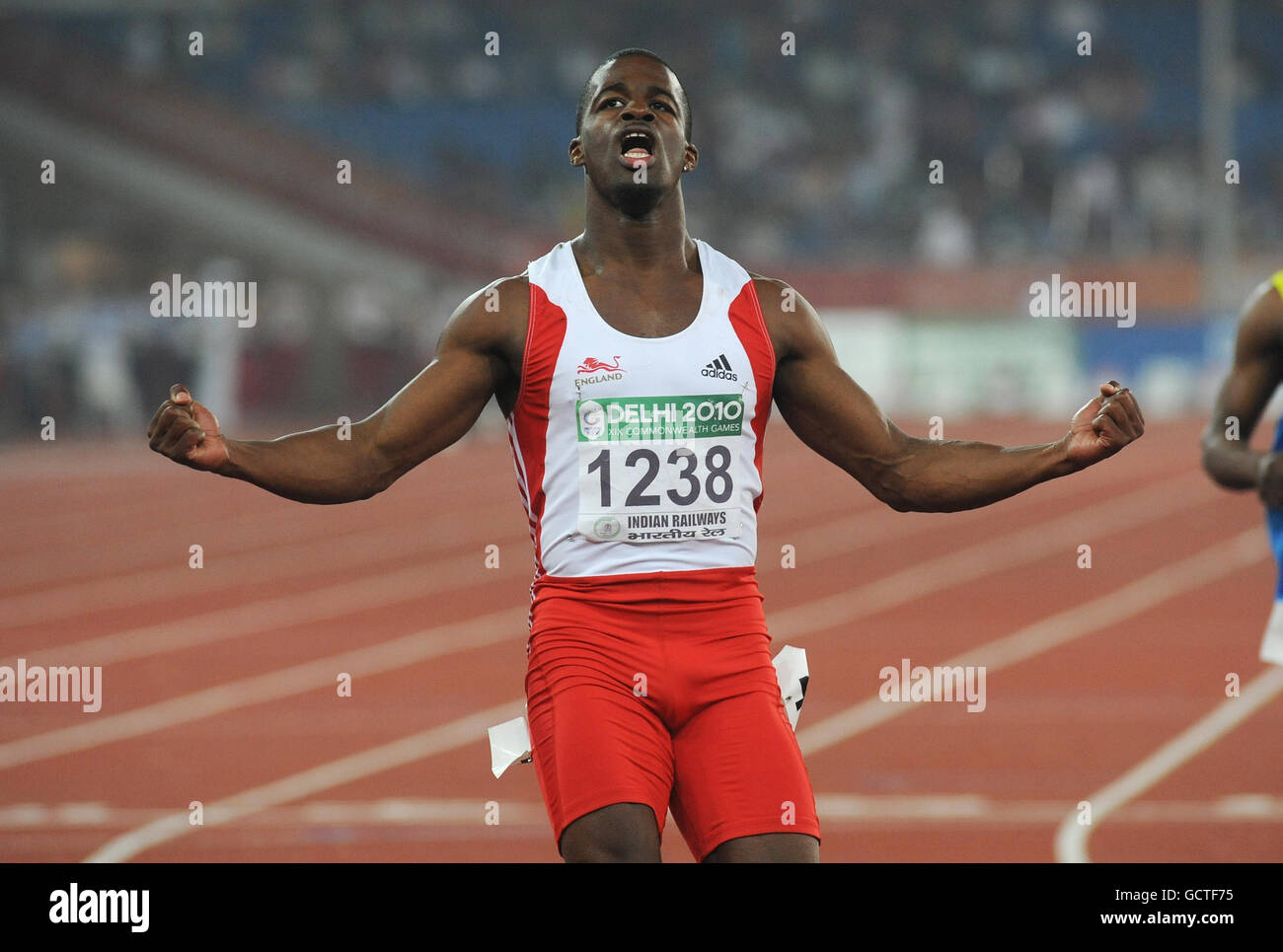 England's Leon Baptiste celebrates winning gold in the Men's 200m Final ...