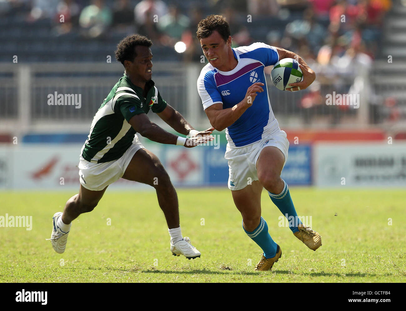 Scotland's Lee Jones (right) in action against Guyana during Day Eight ...