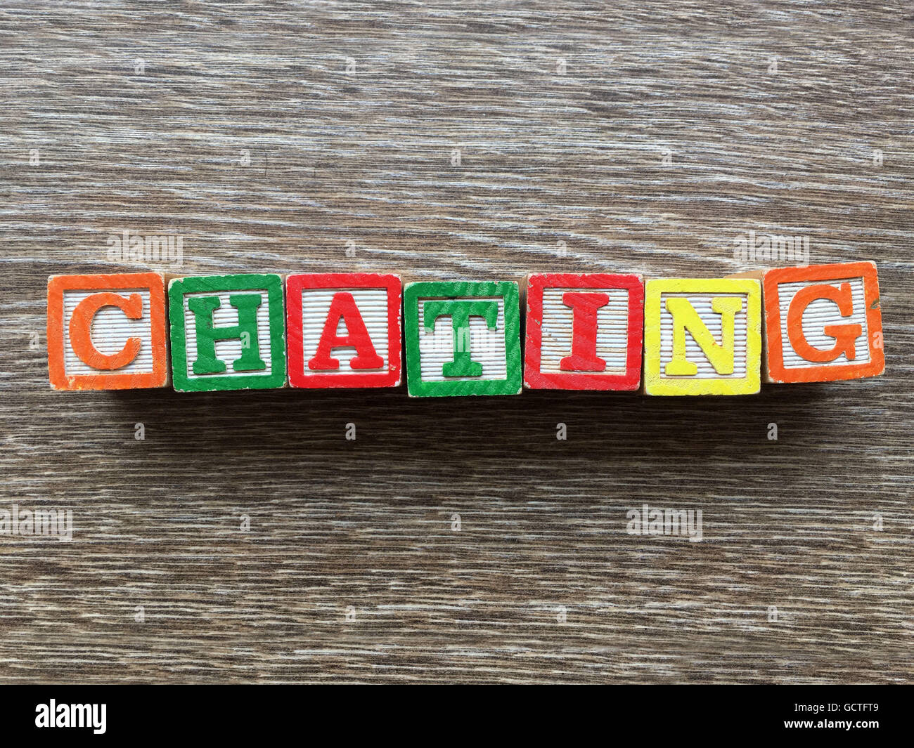 CHATING word written with wood block letter toys Stock Photo - Alamy