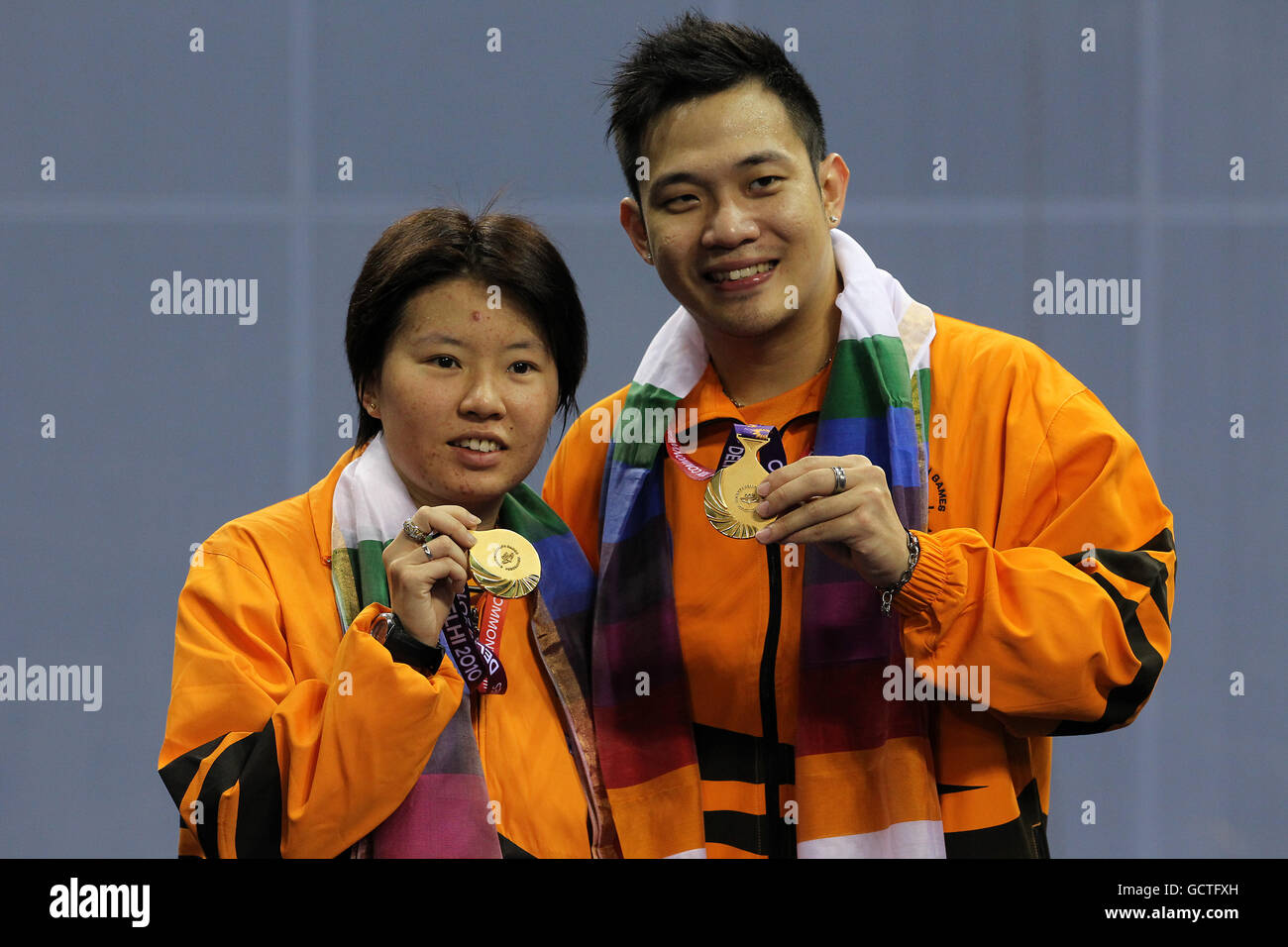 Malaysia's Kien Koo and Ee Chin celebrate with their gold medals after ...
