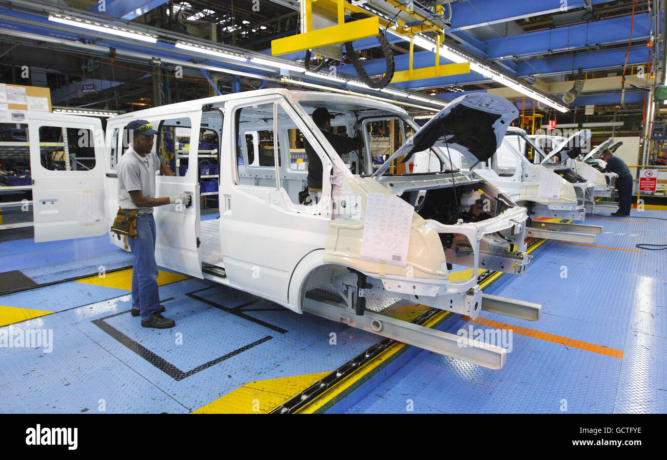 Ford workers assemble Transit vans at their factory in Southampton ...