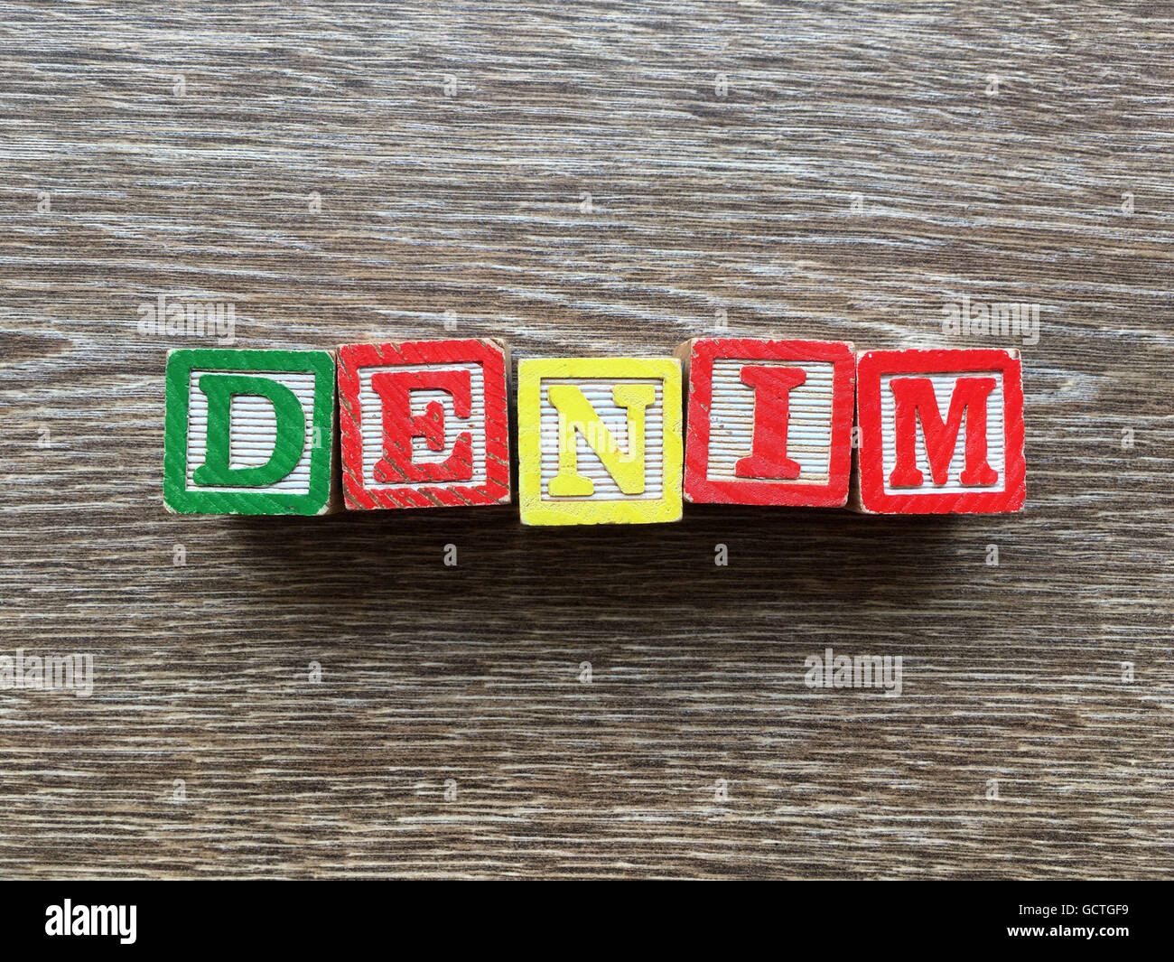DENIM word written with wood block letter toys Stock Photo - Alamy
