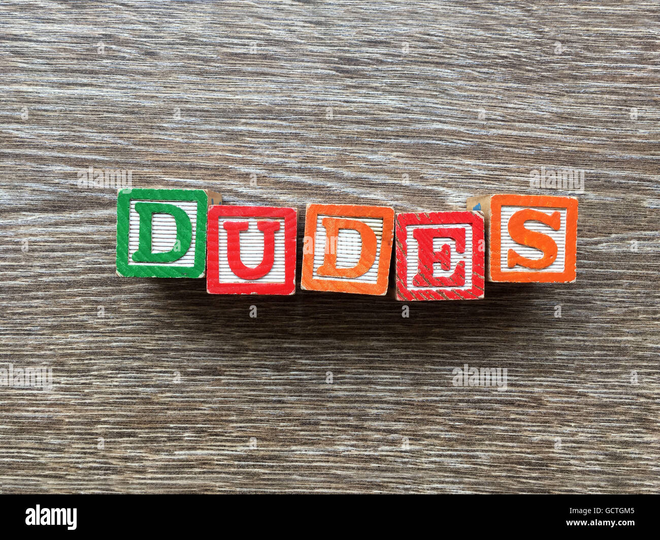 DUDES word written with wood block letter toys Stock Photo - Alamy