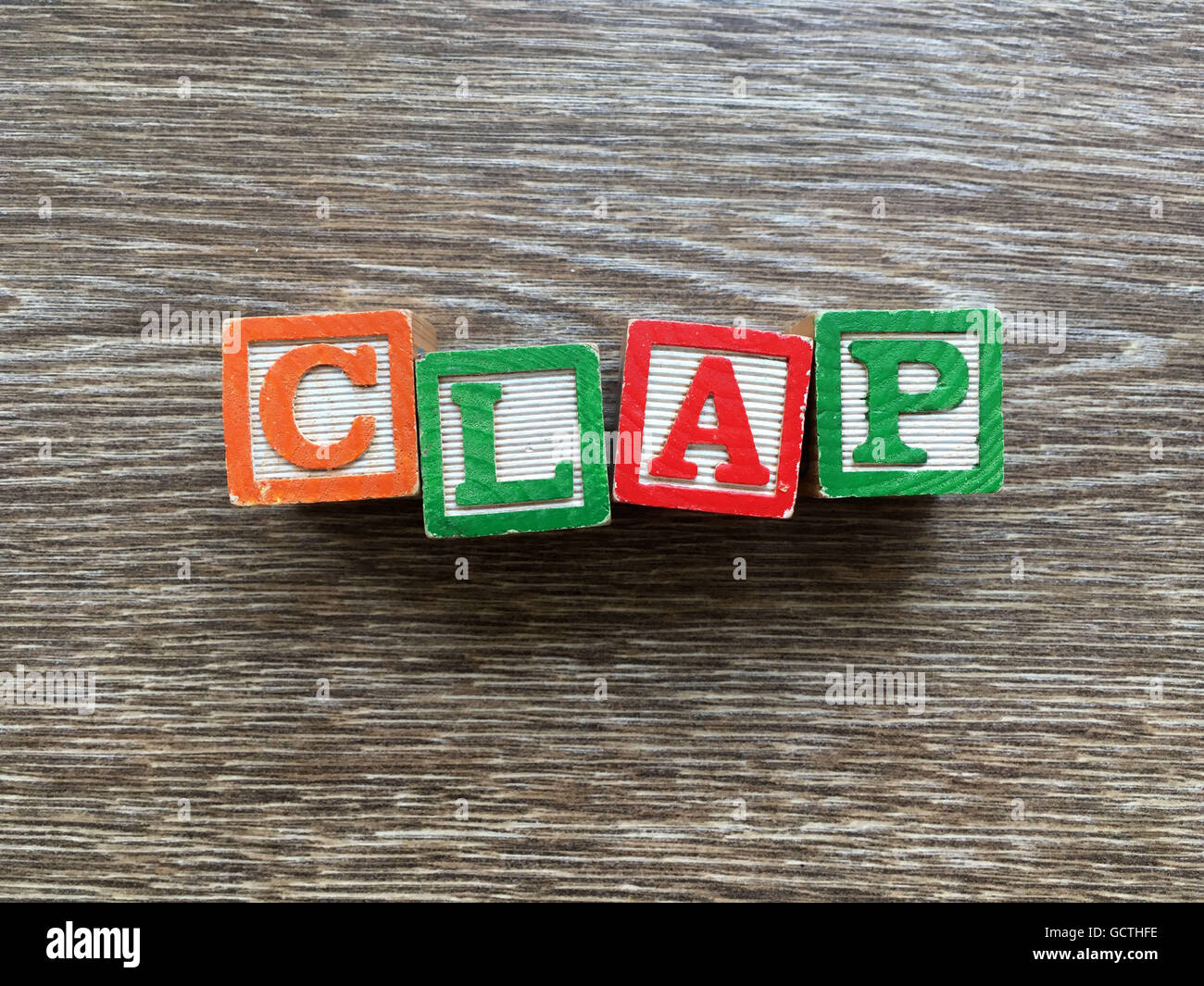 Clap word written wood block hi-res stock photography and images - Alamy