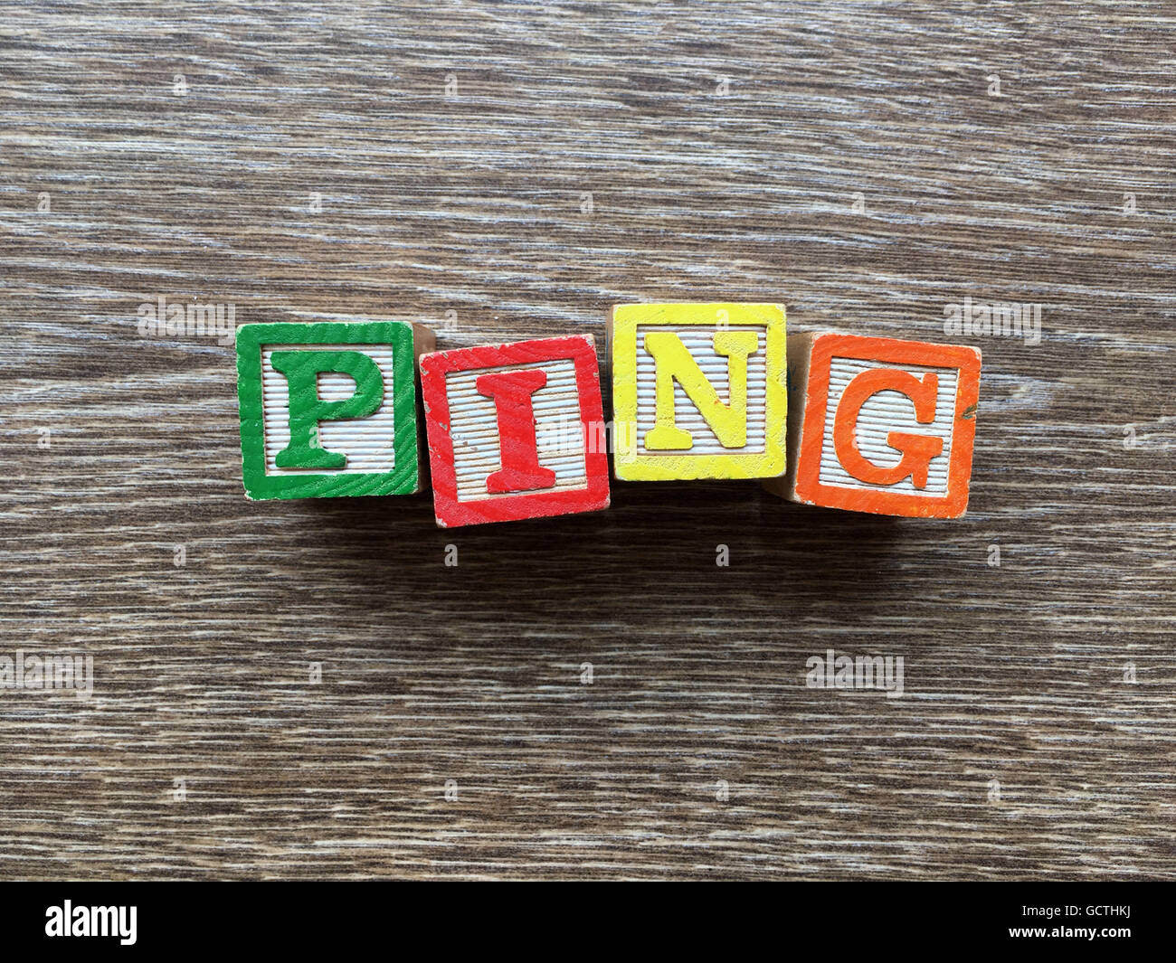PING word written with wood block letter toys Stock Photo - Alamy