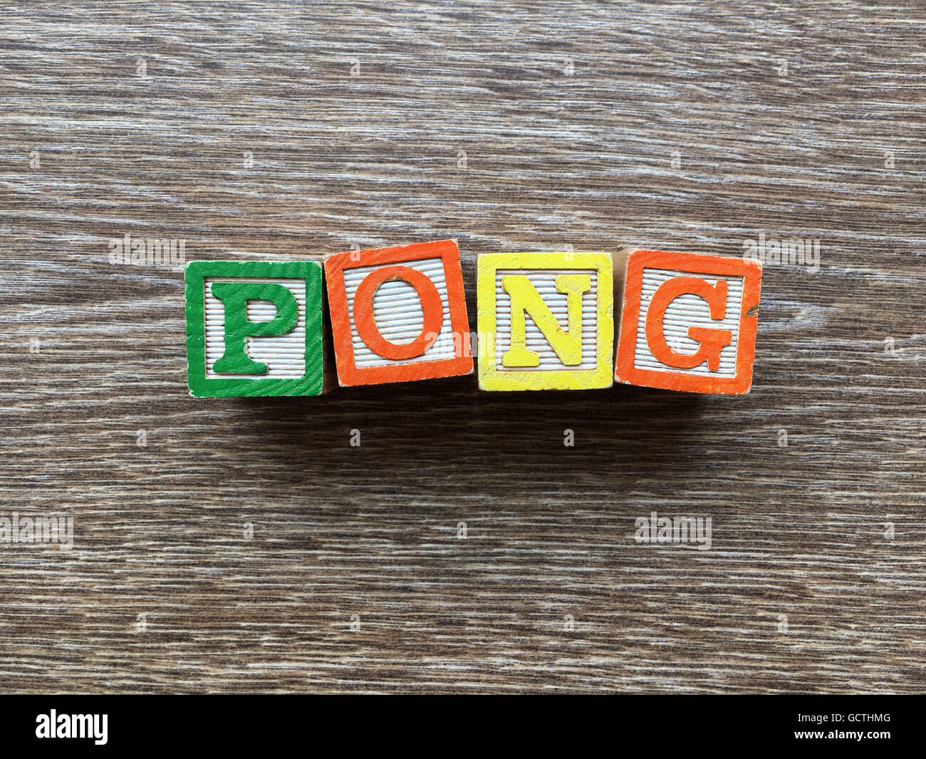 PONG word written with wood block letter toys Stock Photo - Alamy