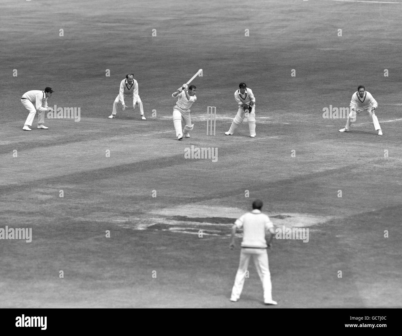 Peter Parfitt, Middlesex, cover drives a ball from Edwin Smith for four ...