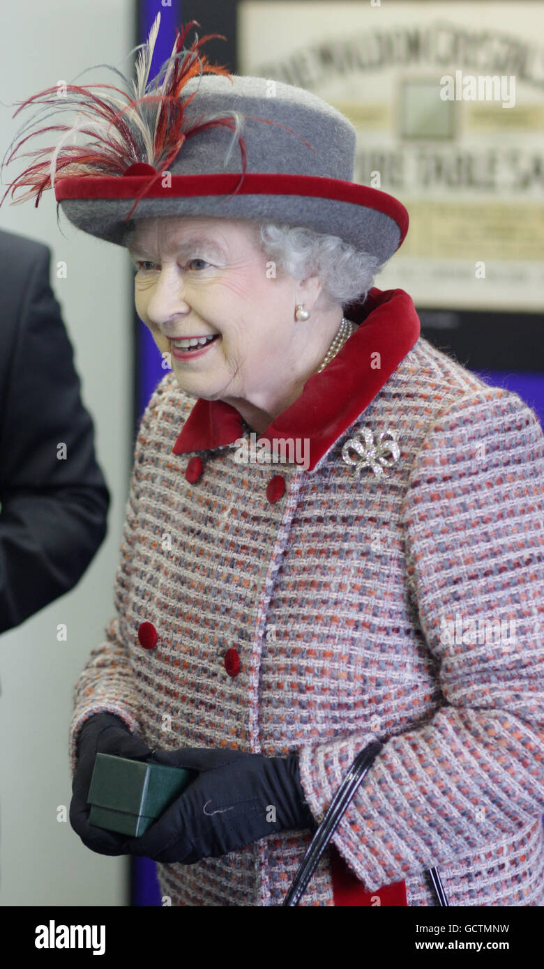 Britain's Queen Elizabeth II is shown the process of salt crystal ...