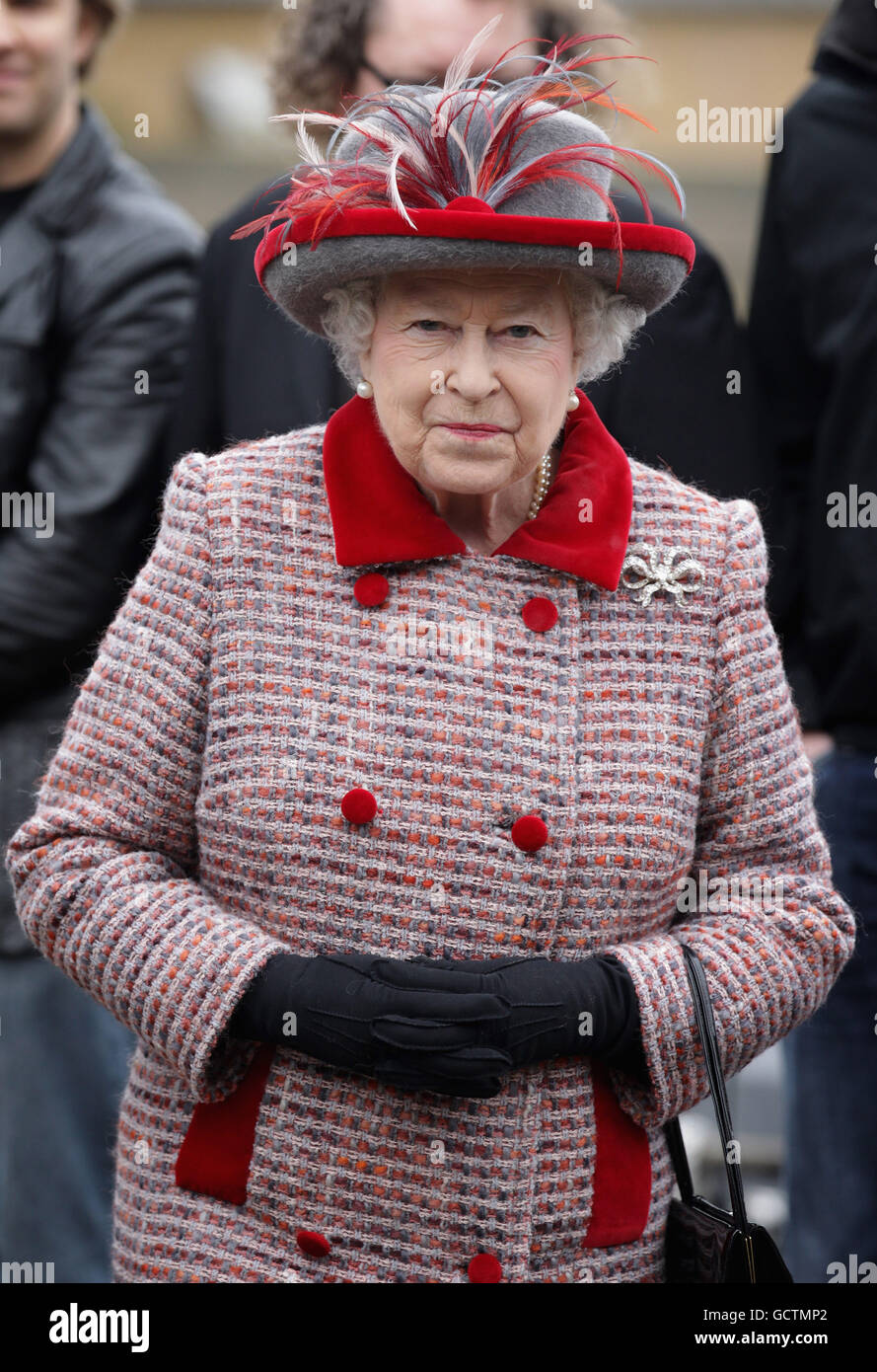 Britain's Queen Elizabeth II is shown the process of salt crystal ...
