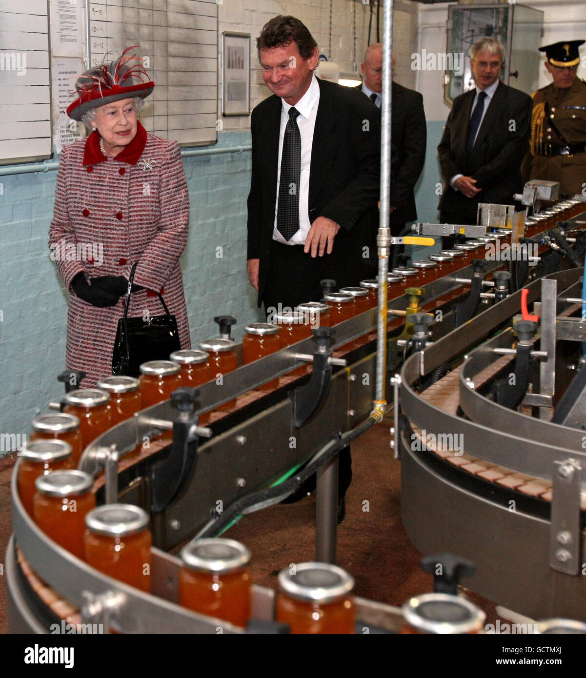 Queen Elizabeth II during a tour of the Wilkin and Son's Jam factory in ...