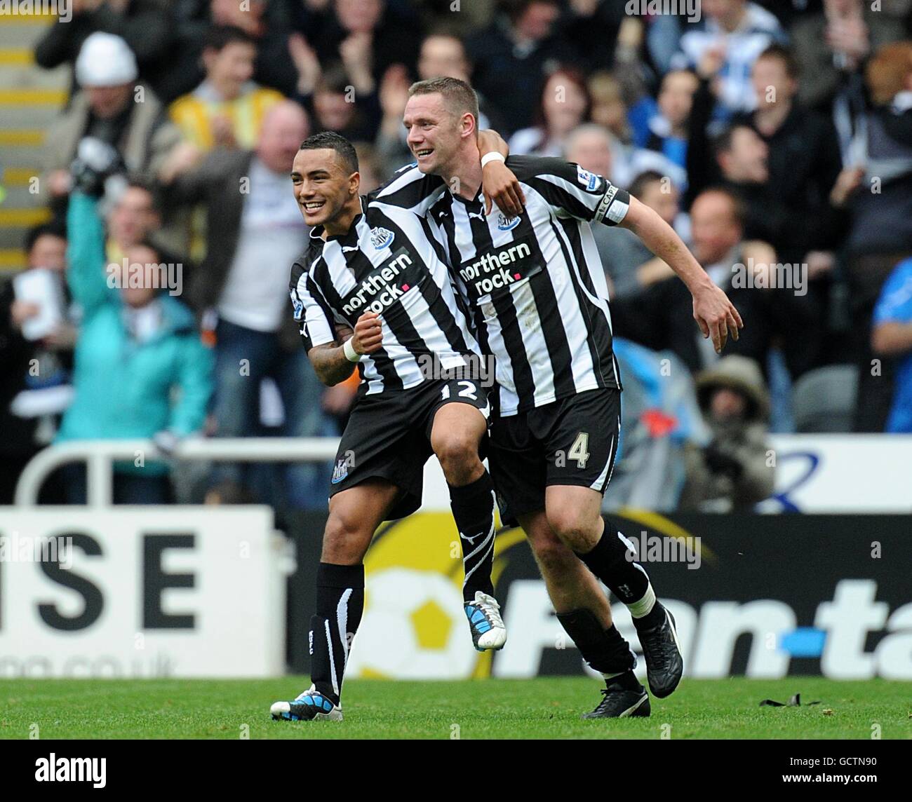 Newcastle United's Kevin Nolan (right) celebrates scoring his sides ...