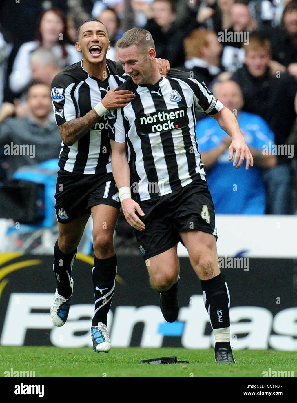Newcastle United's Kevin Nolan (right) celebrates after scoring his ...