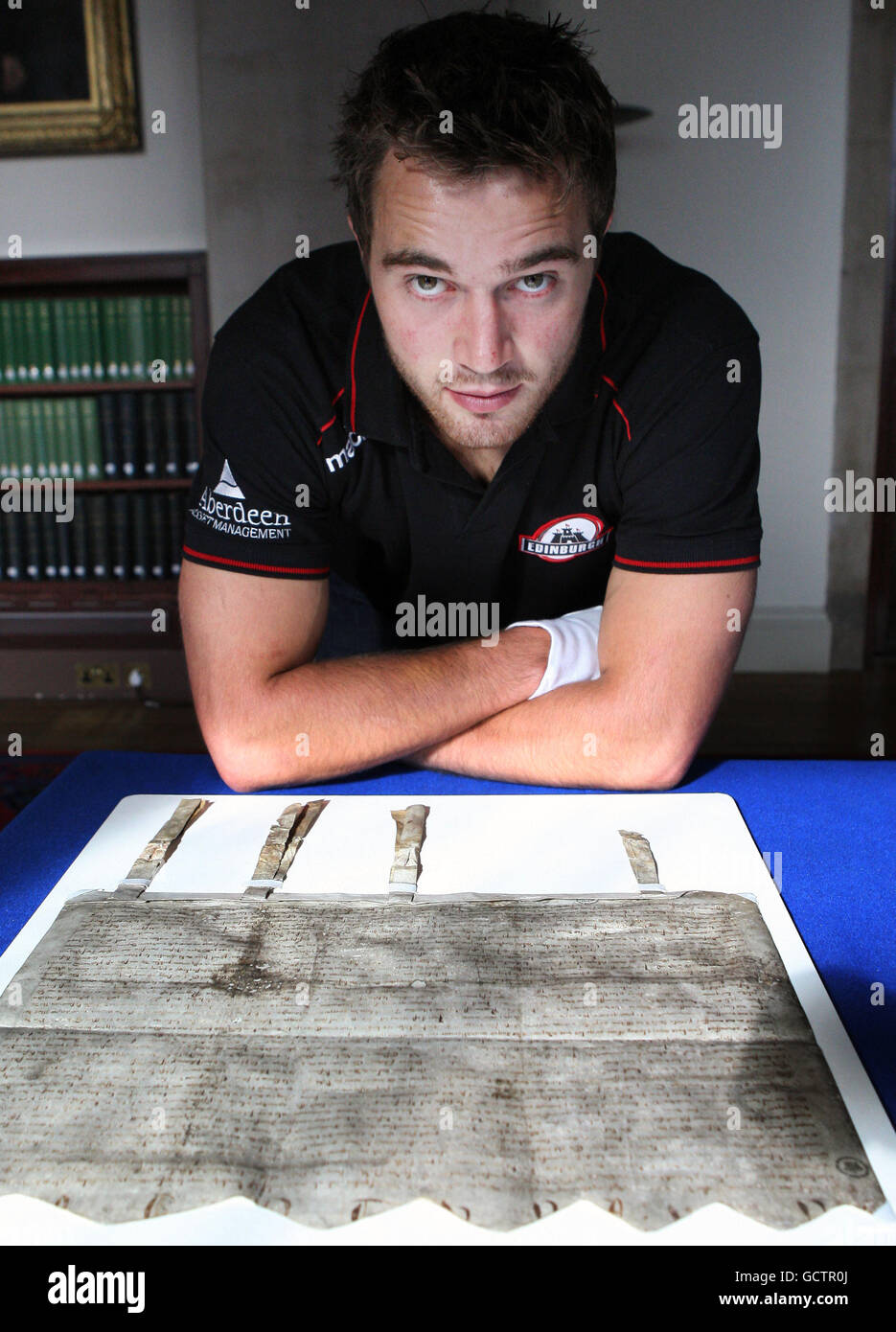 Edinburgh's Alex Grove poses alongside the Treaty of Edinburgh ...