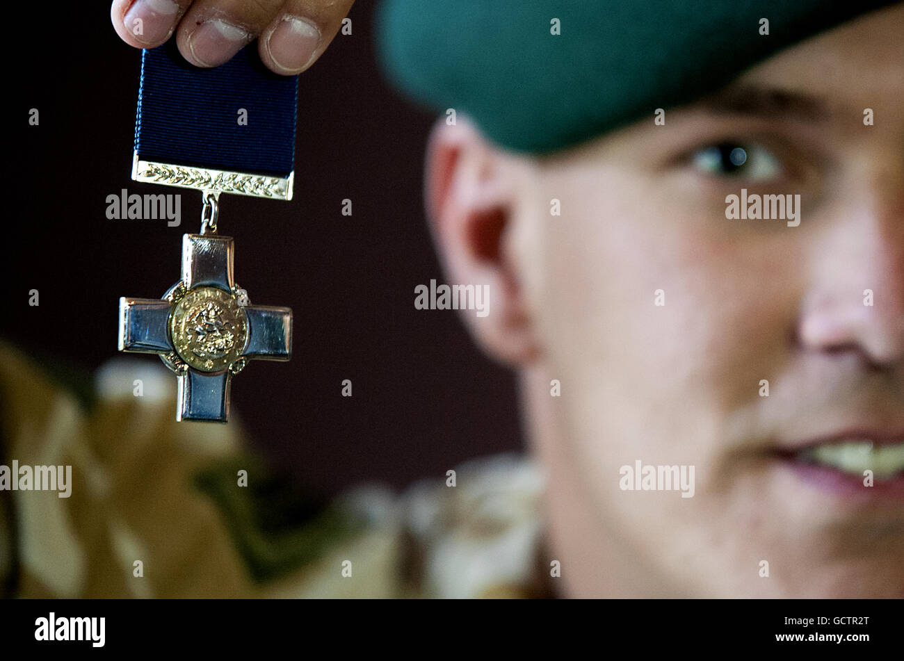 Lance Corporal Matt Croucher Presents George Cross To The Imperial War