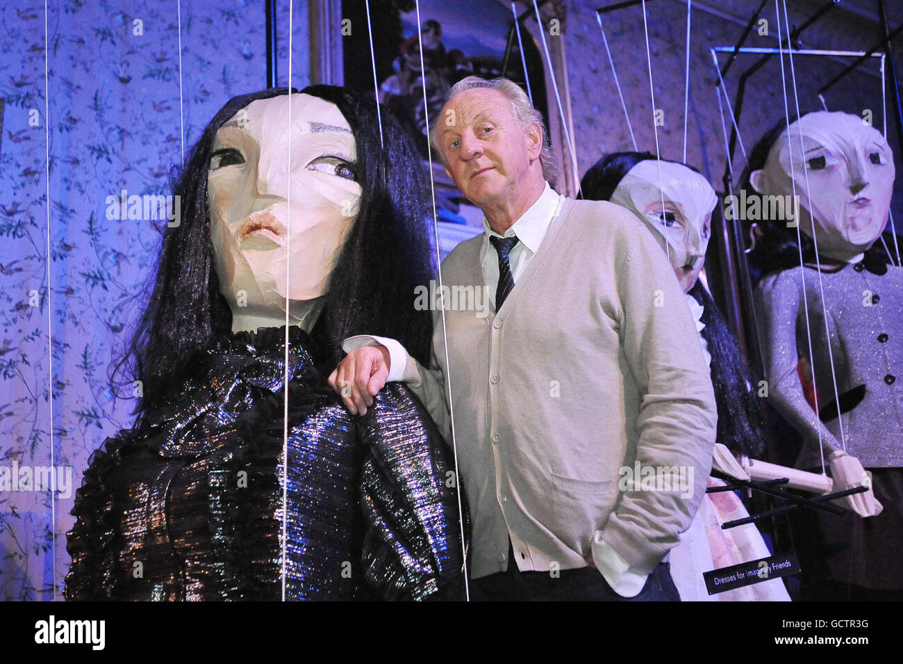Irish designer Paul Costelloe with some of the giant puppets clad in ...